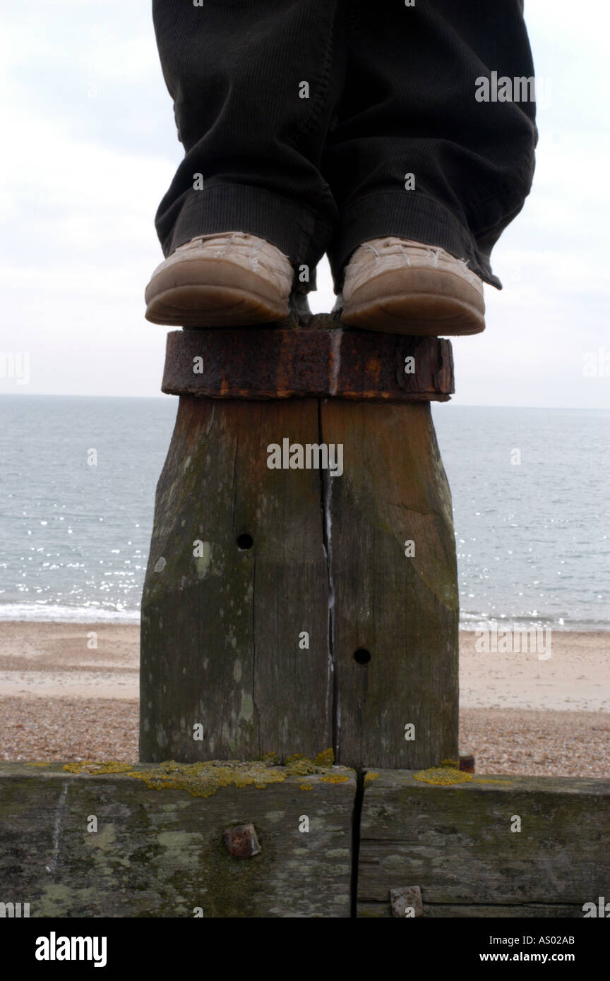 Standing on Sea Fence Stock Photo - Alamy