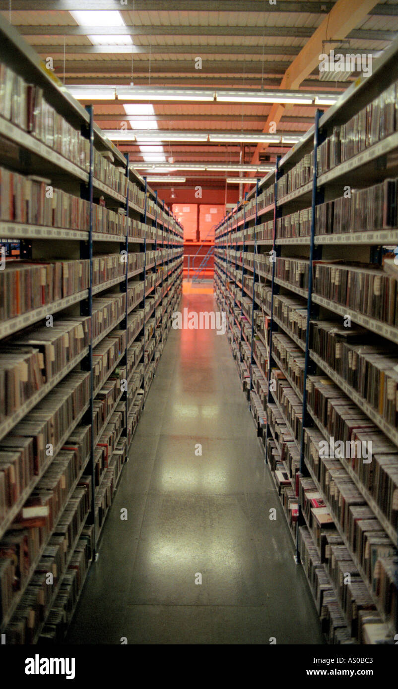 A view down an aisle in a warehouse Stock Photo - Alamy