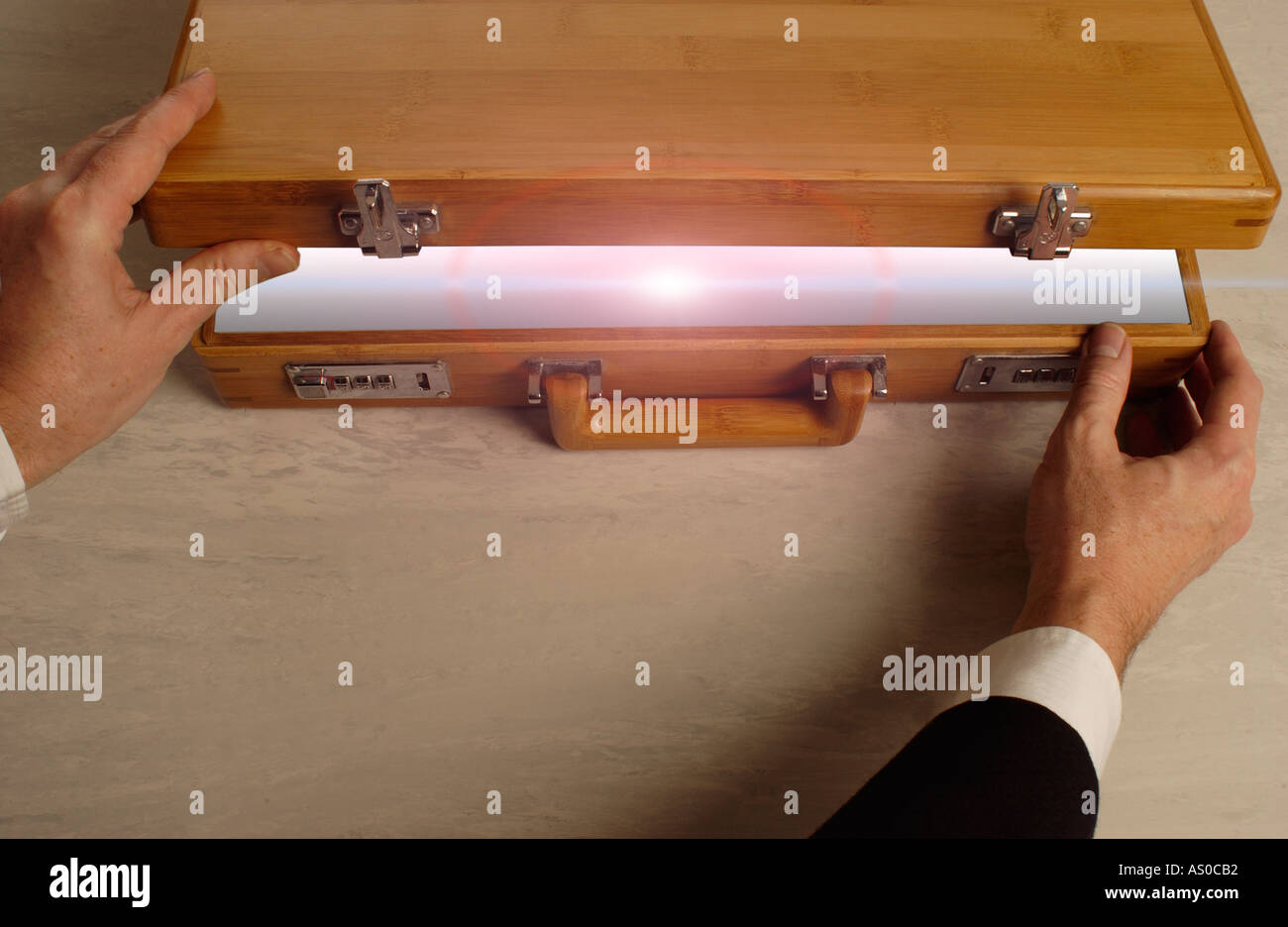 Opening a briefcase hi-res stock photography and images - Alamy