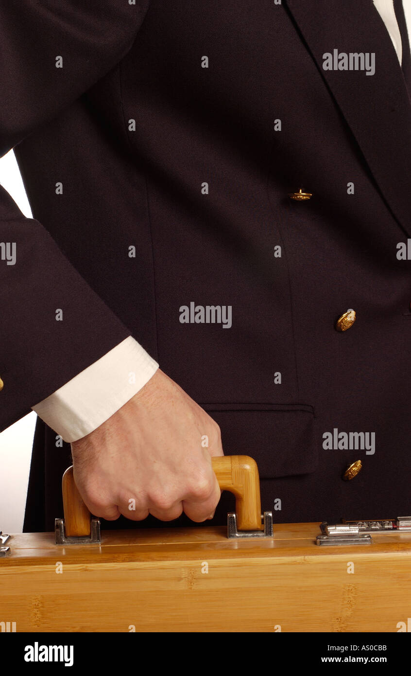 man carrying briefcase wearing business suit Stock Photo - Alamy