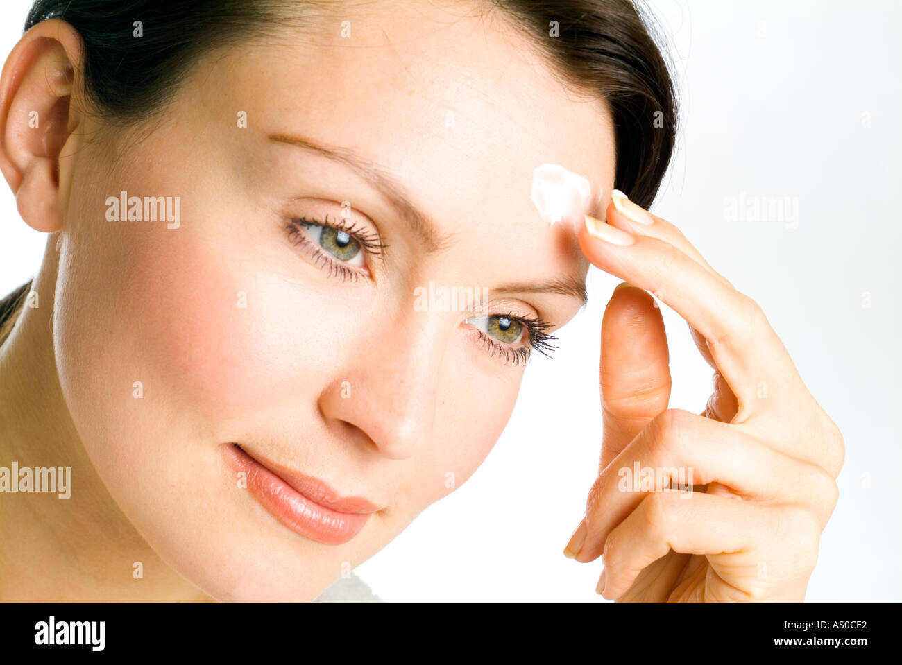 Cream and rub face female hi-res stock photography and images - Alamy