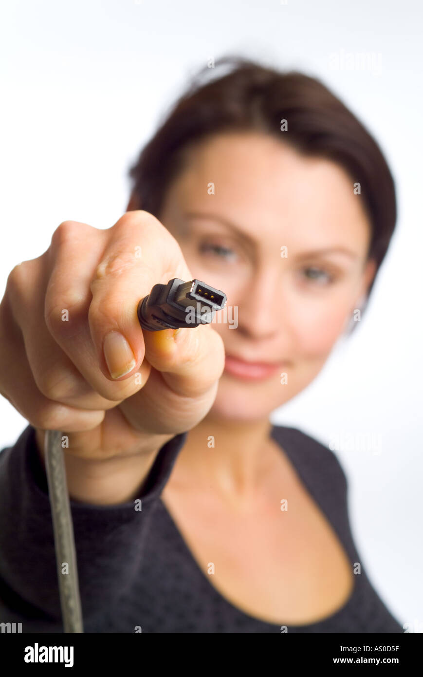 woman with cable connector Stock Photo - Alamy