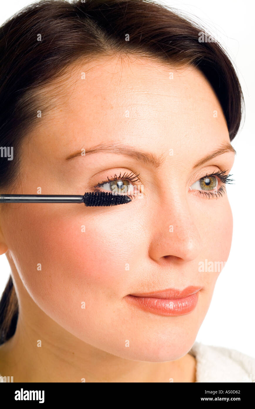 woman applying mascara Stock Photo - Alamy