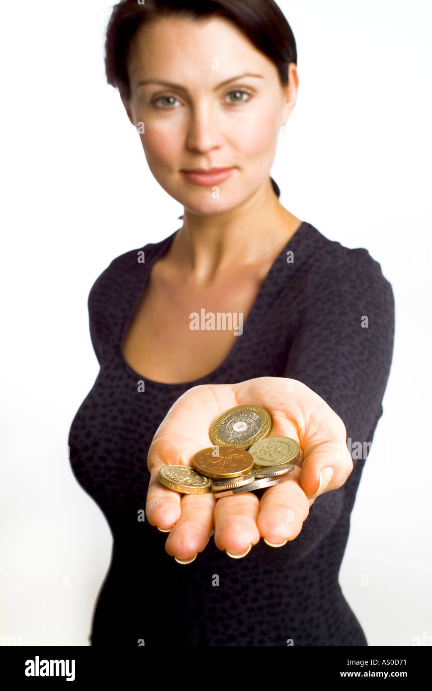 woman with coins in her hand Stock Photo - Alamy