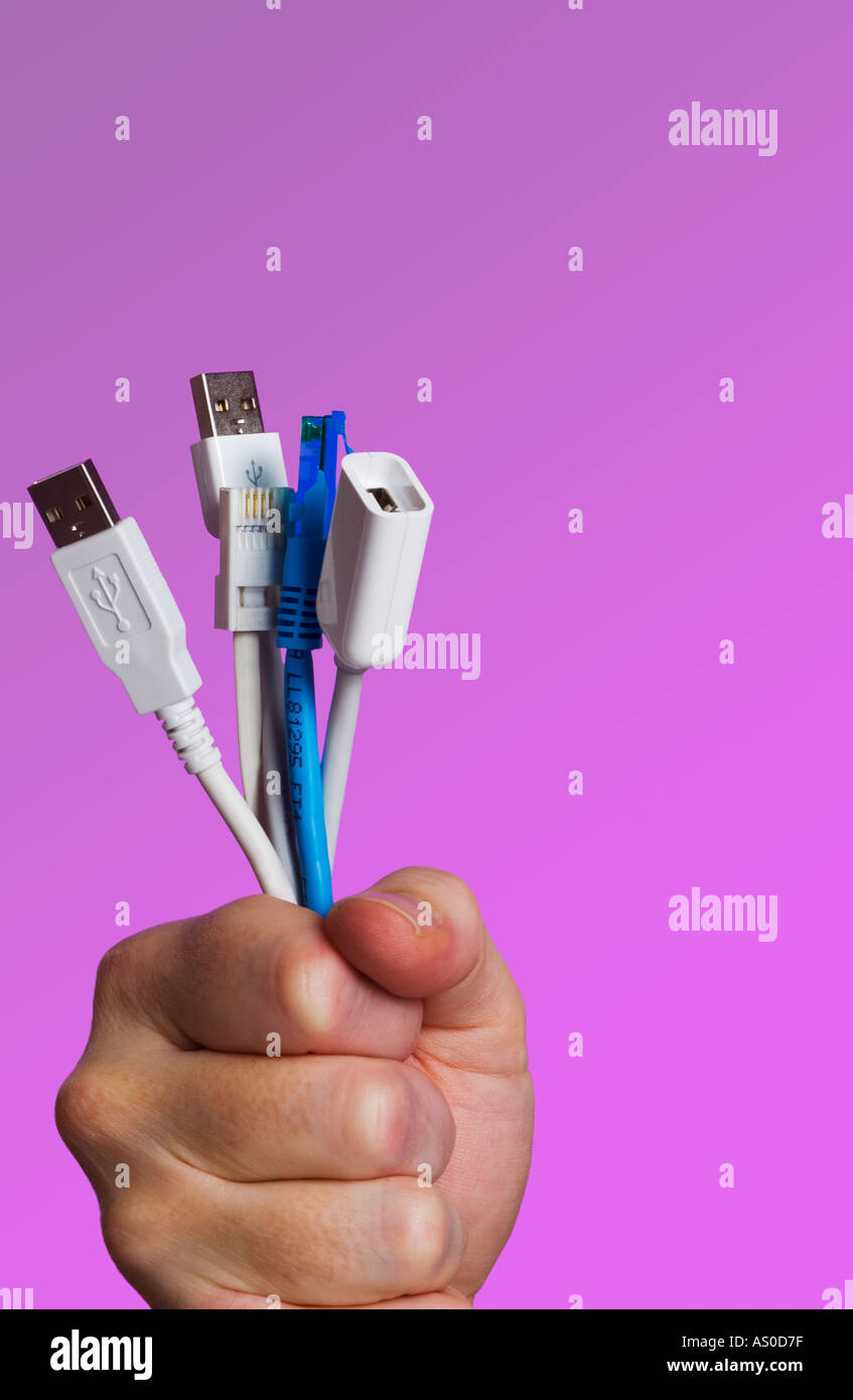 Hand plugs ethernet cable into router hi-res stock photography and ...
