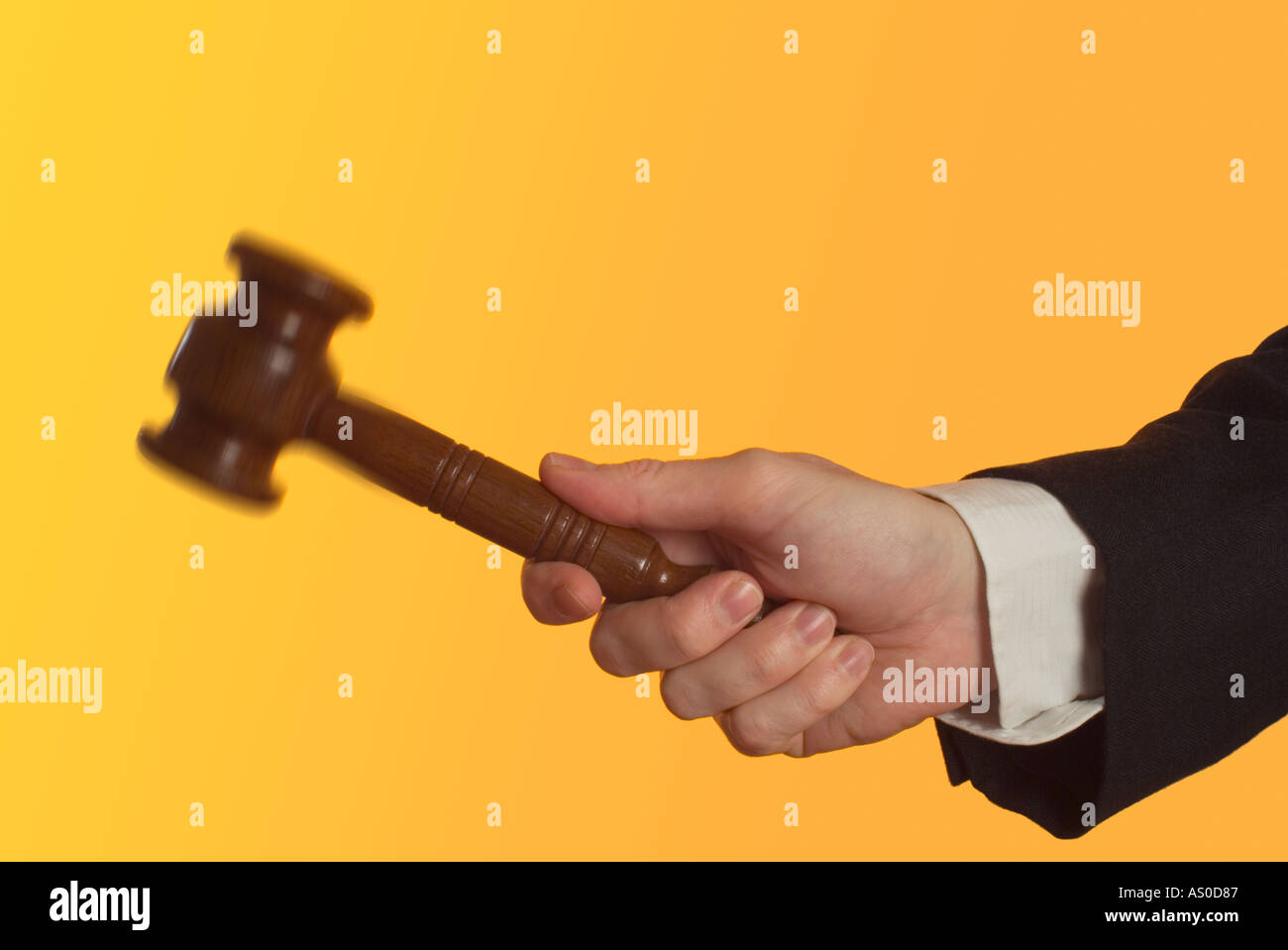hand with gavel Stock Photo - Alamy