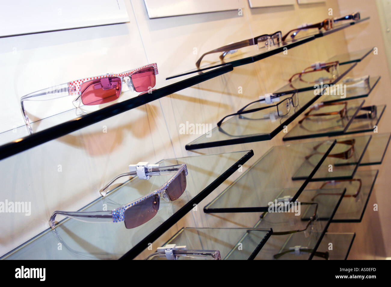 Designer spectacle frames on display in an optician s store Stock Photo ...