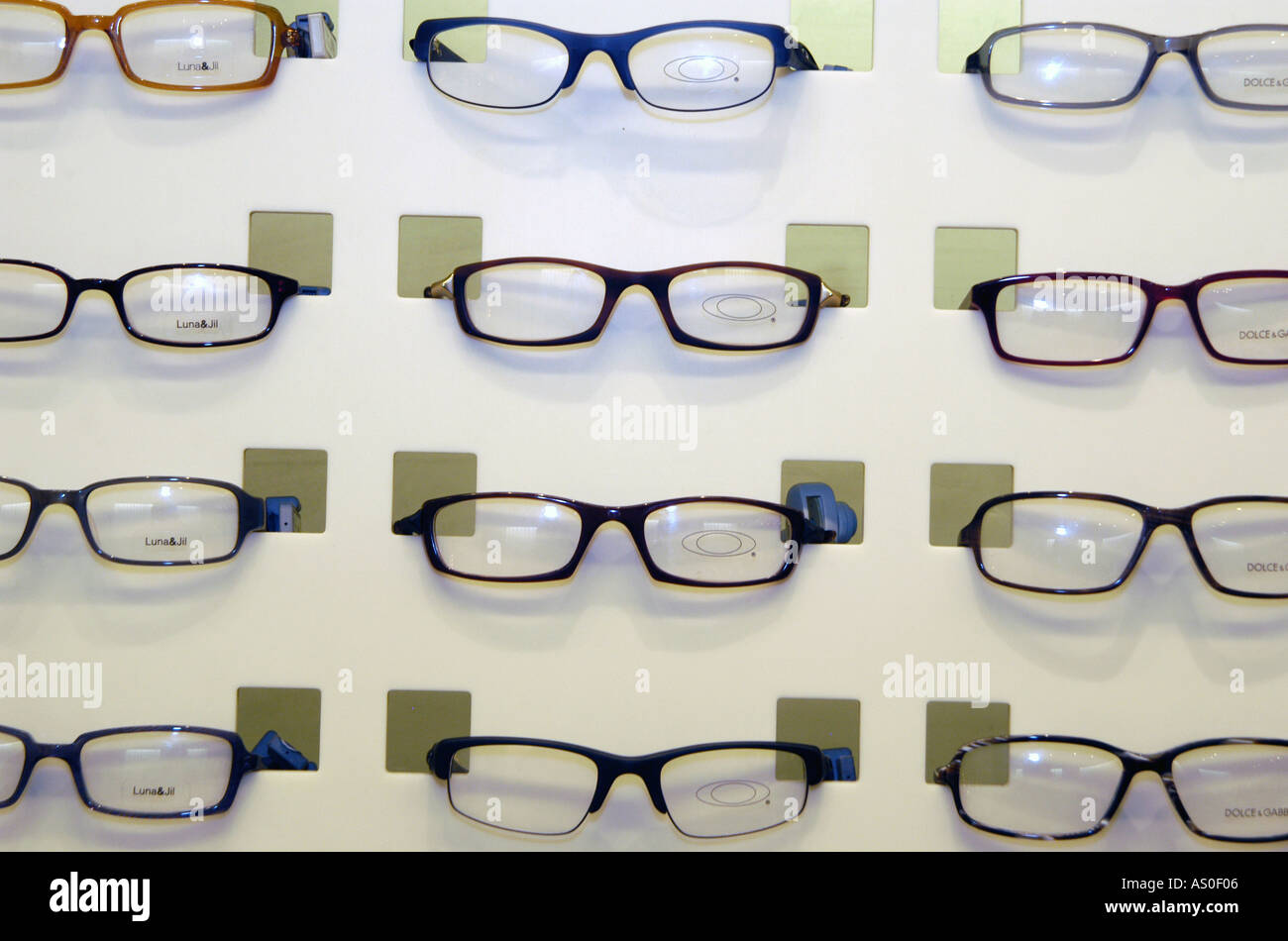 Designer spectacle frames on display in an optician s store Stock Photo ...