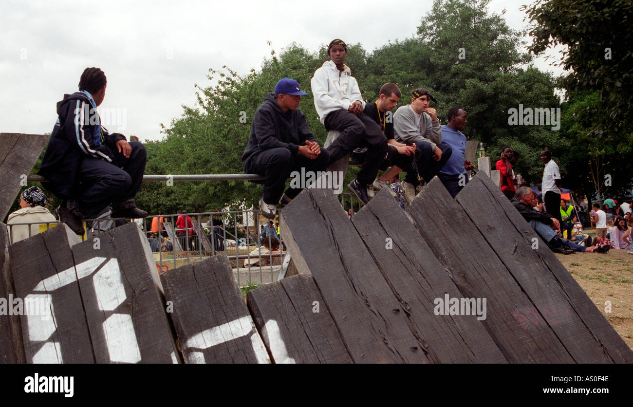 teenaged youth hanging around park in west London Stock Photo - Alamy