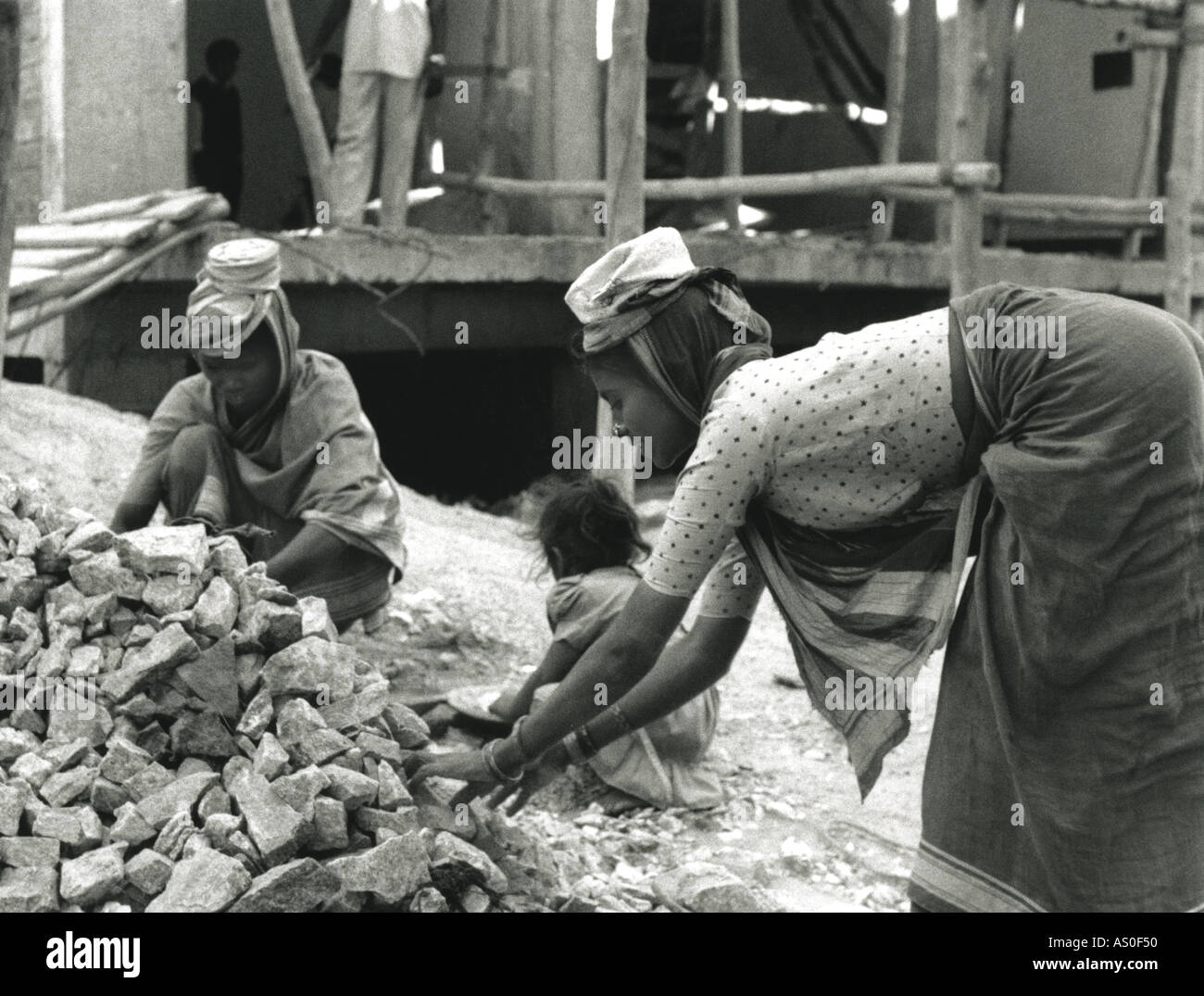 Child labour is exposed on a building site in a rural area of India ...