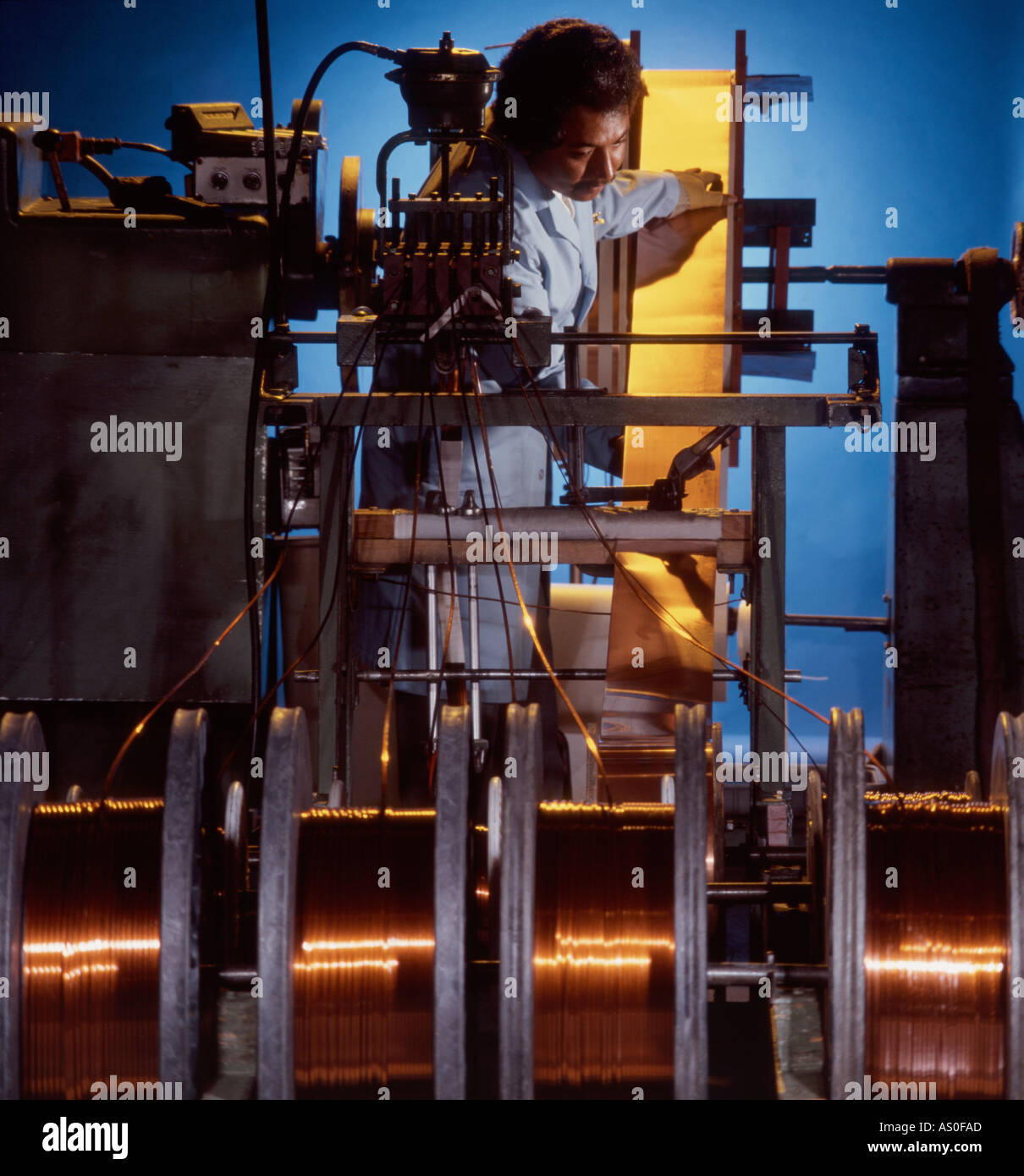 manufacturing of a motor winding with a copper core Stock Photo - Alamy
