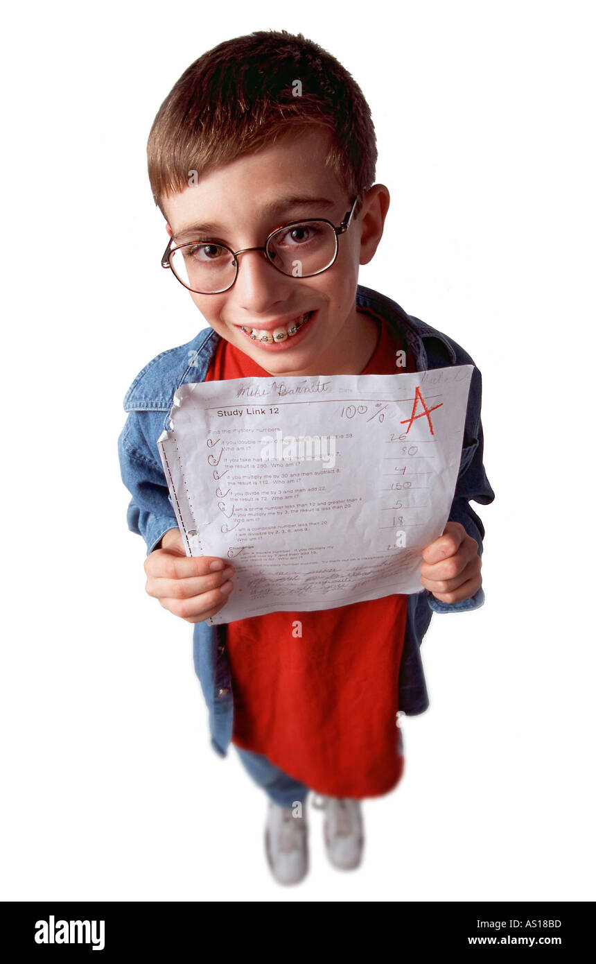 Boy showing test with A grade silhouetted on white background Stock ...