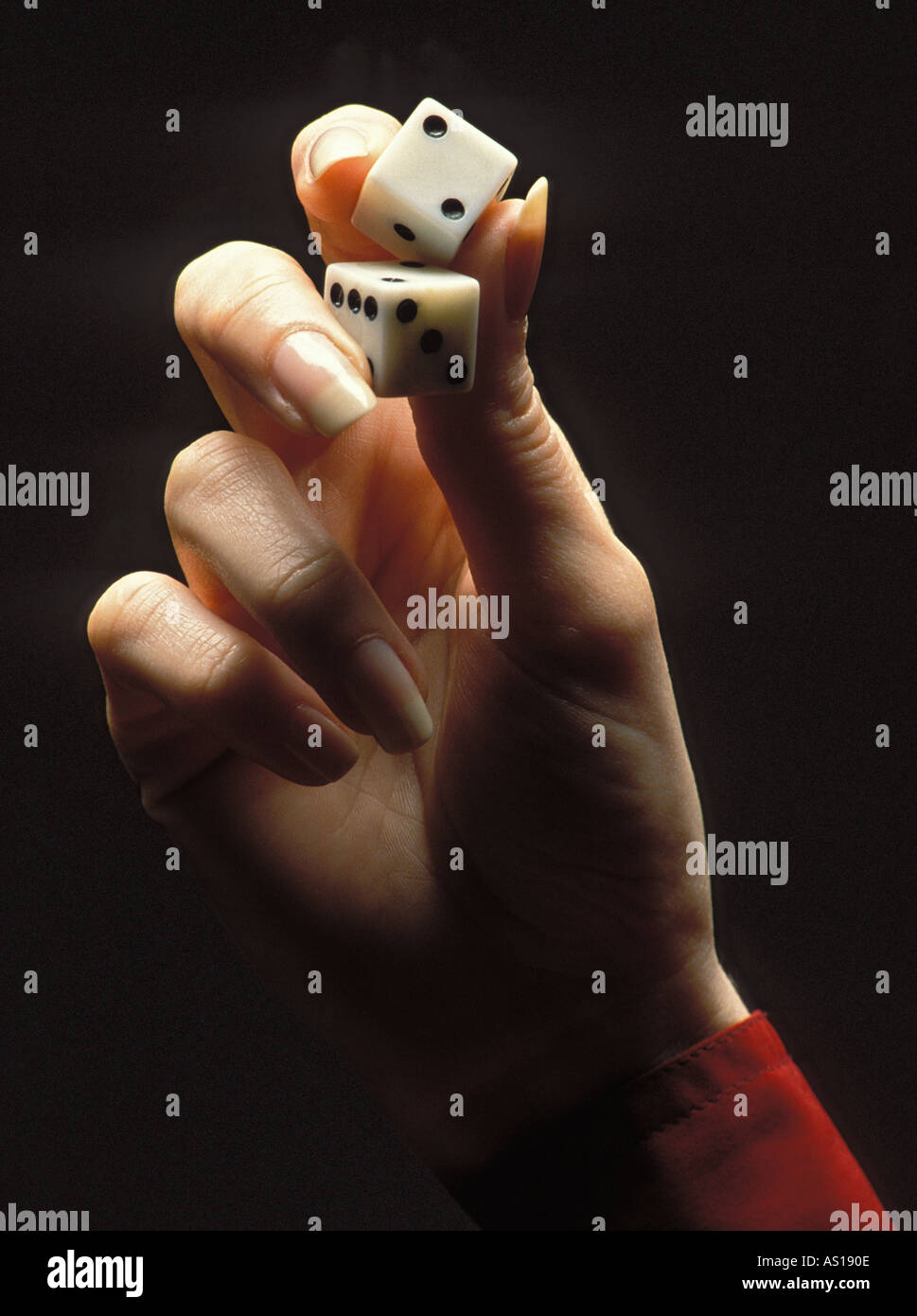 Hand holding pair dice hi-res stock photography and images - Alamy