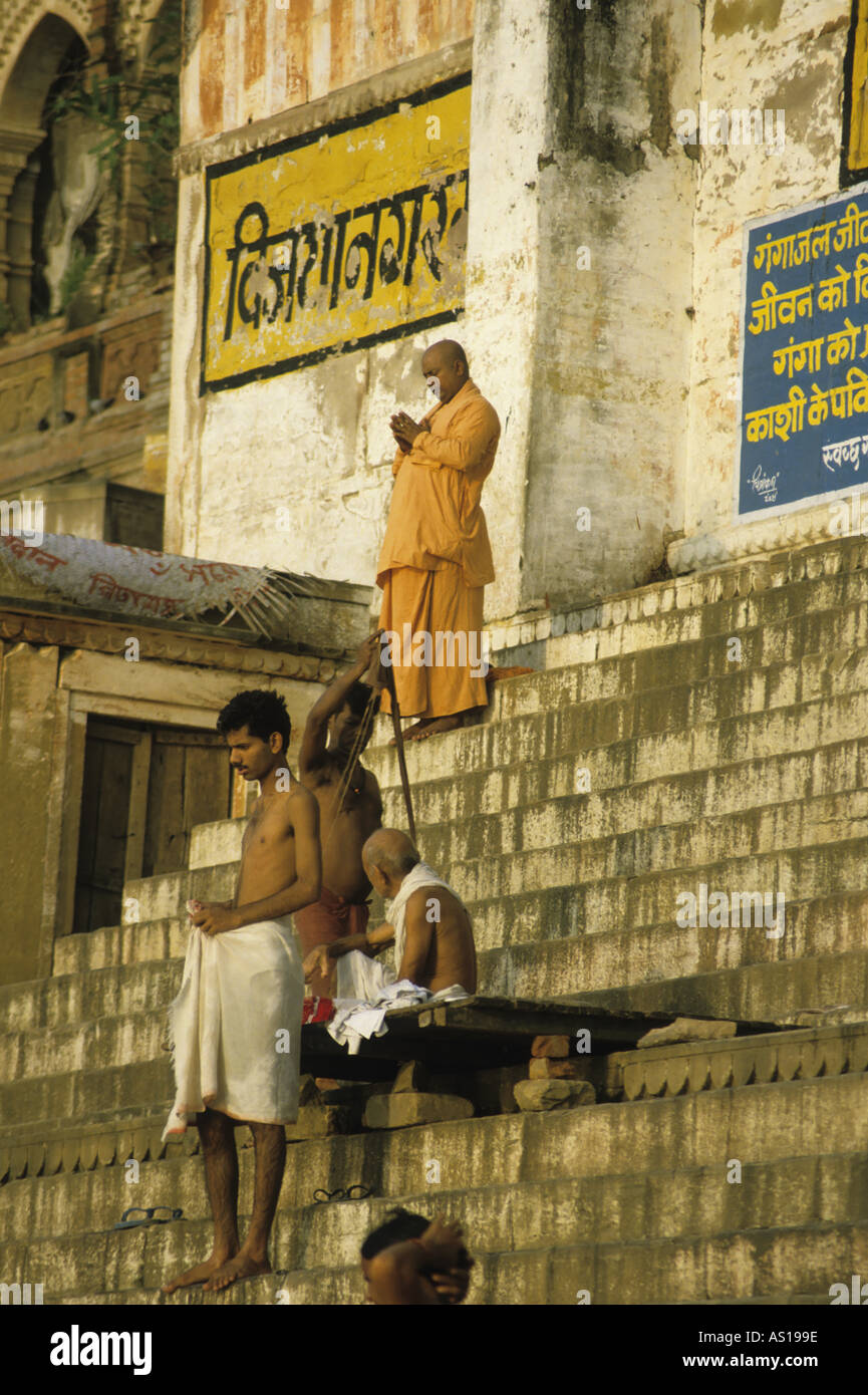 India Benares Varanasi People Performing Ablutions On The River Gange ...