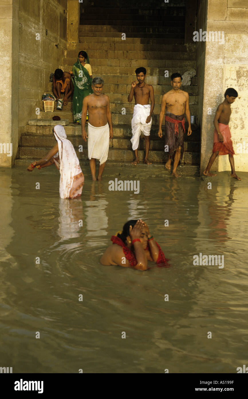 River Ganges, India - People performing ablutions in the River Ganges ...