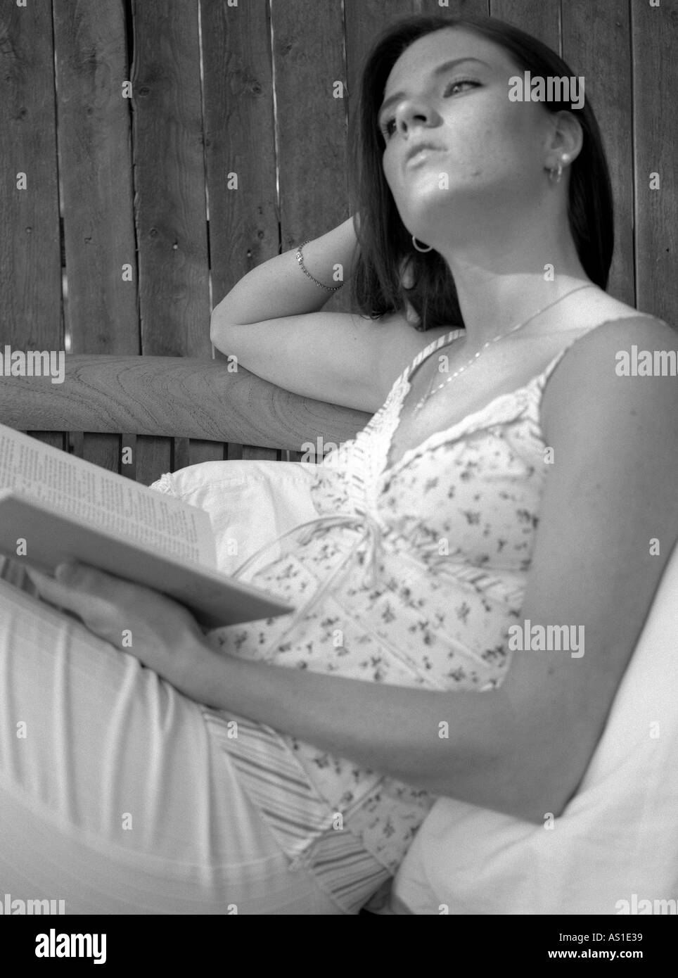 Women reading a book Stock Photo - Alamy
