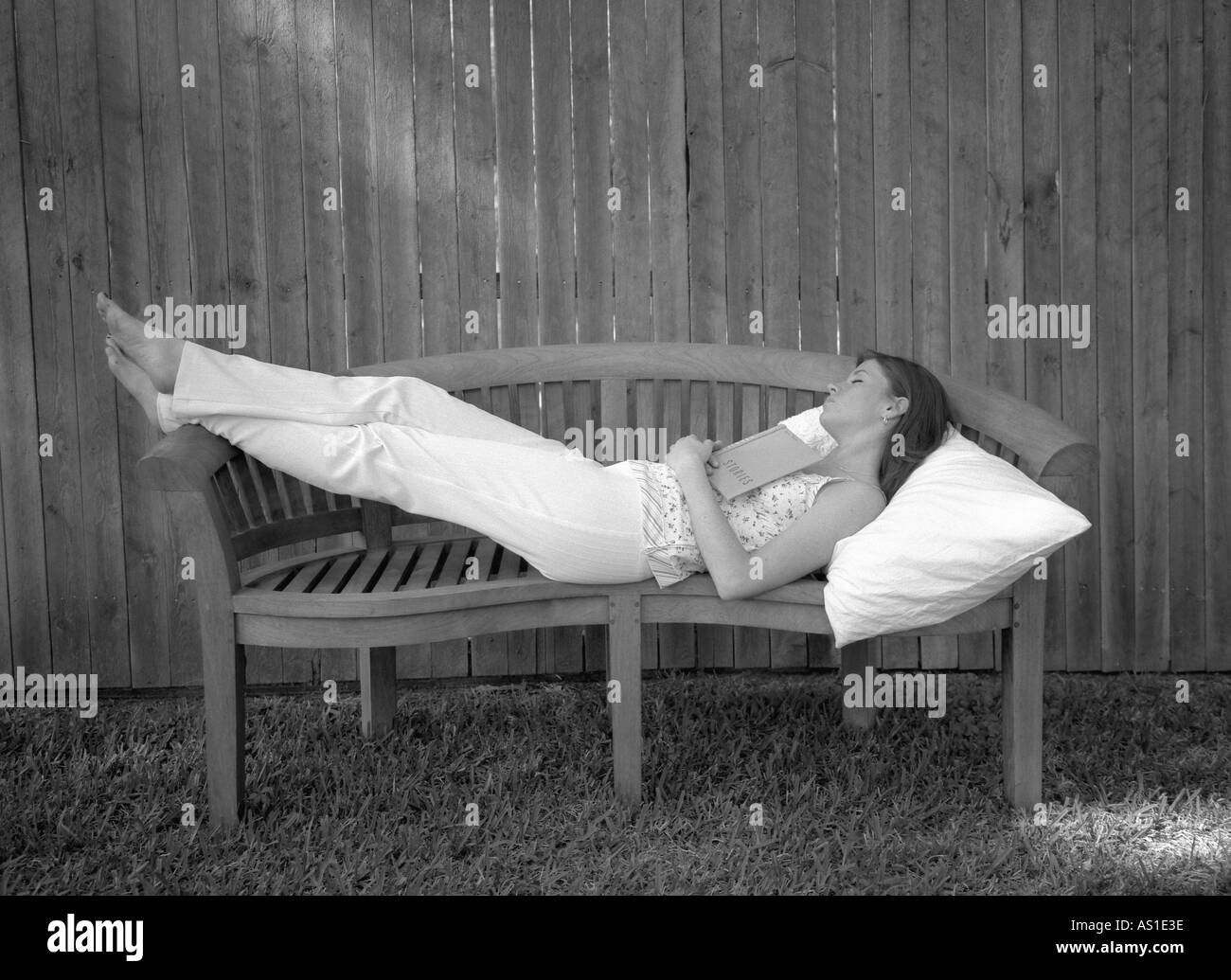 Book on a bench Black and White Stock Photos & Images - Alamy
