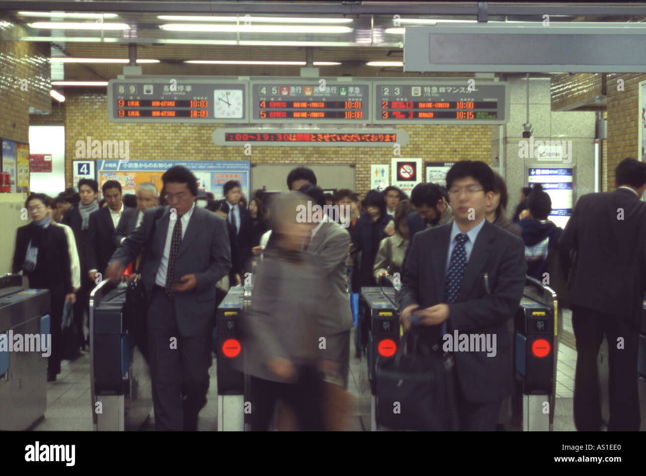 Crowd at the subway entrance in the Shinjuku station Tokyo Japan Stock ...