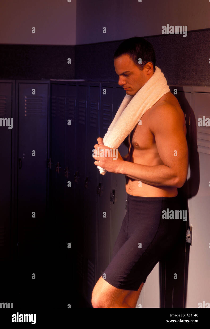 Man in locker room standing Stock Photo - Alamy