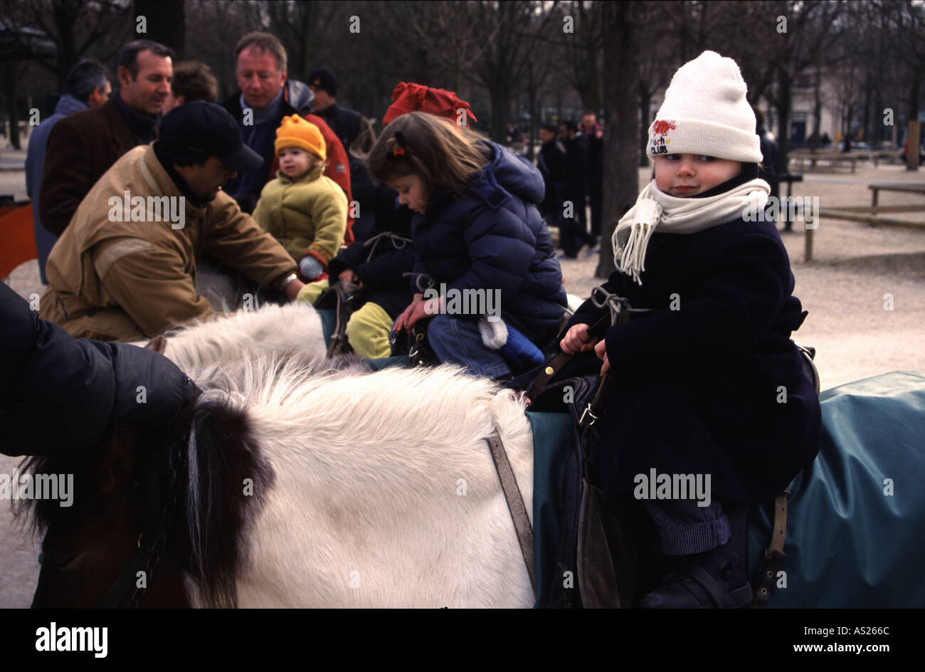 Some Parisien children saddle up for a pony ride in the famous ...