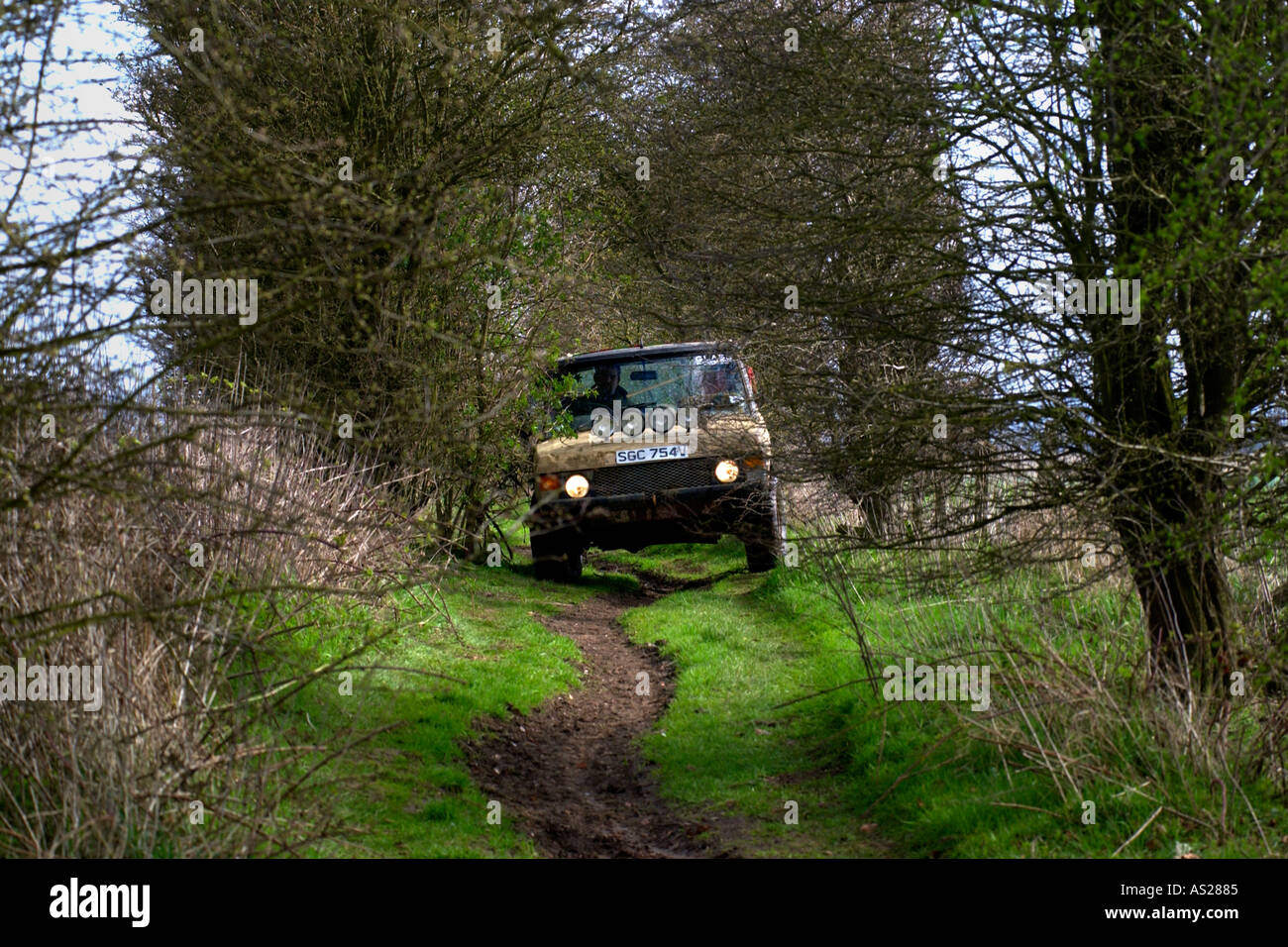 Members of the Green Lane Association driving their Land Rovers ...
