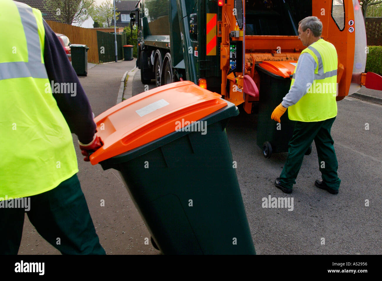 City workers collect domestic garden waste for composting from outside ...