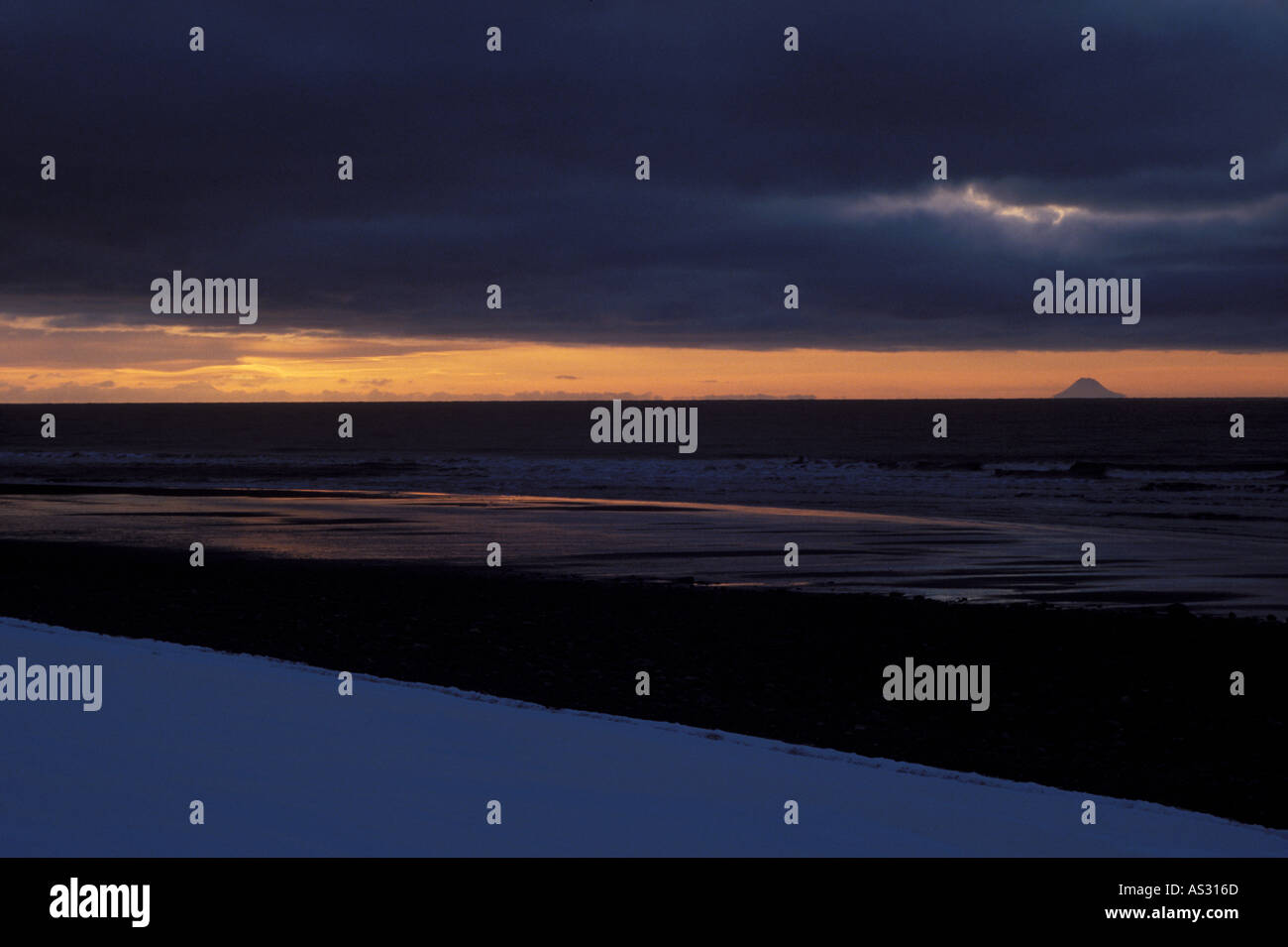 Sunset at Cook Inlet with Augustine volcano winter seen from Anchor ...