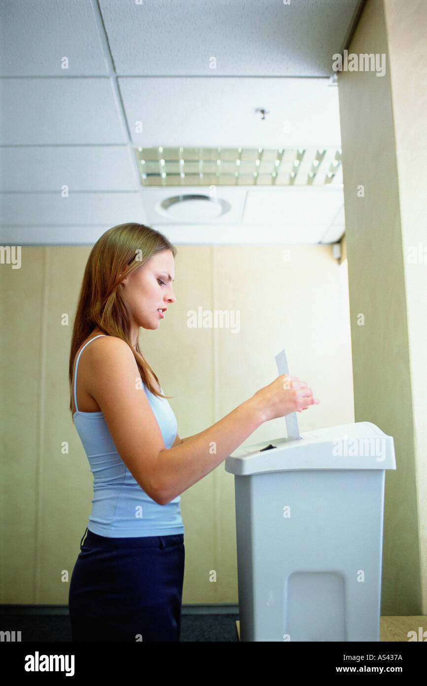 Woman shredder office hi-res stock photography and images - Alamy