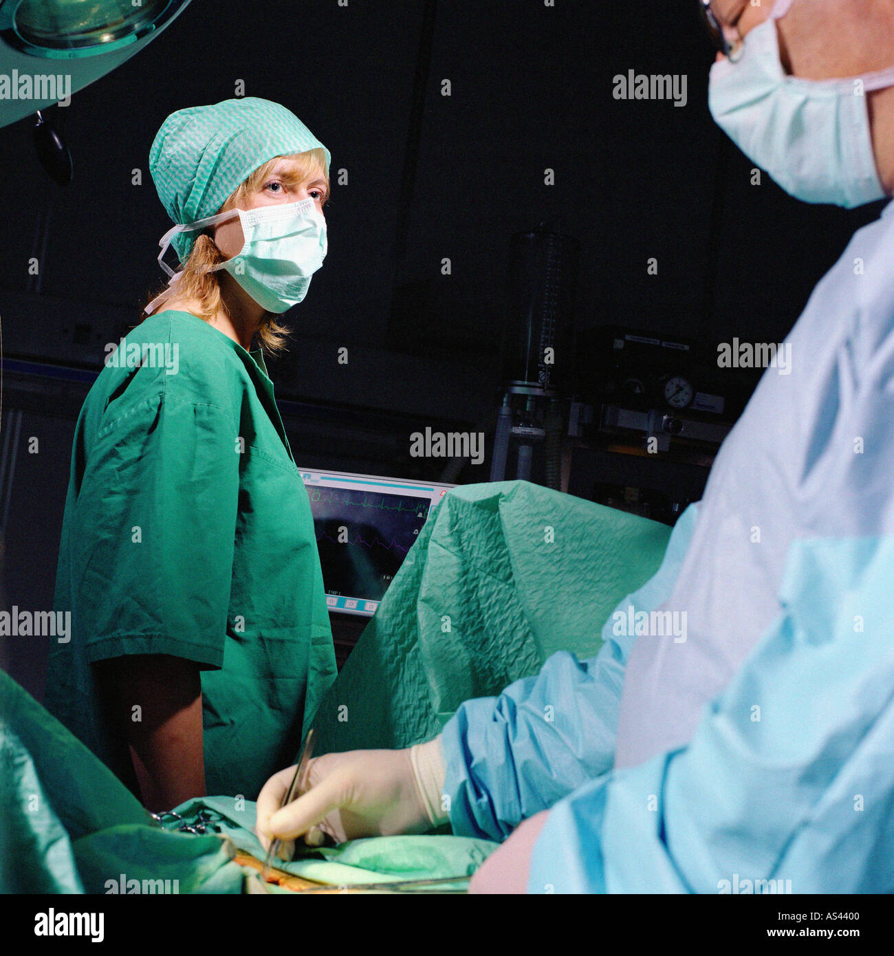 Surgical team with patient Stock Photo - Alamy