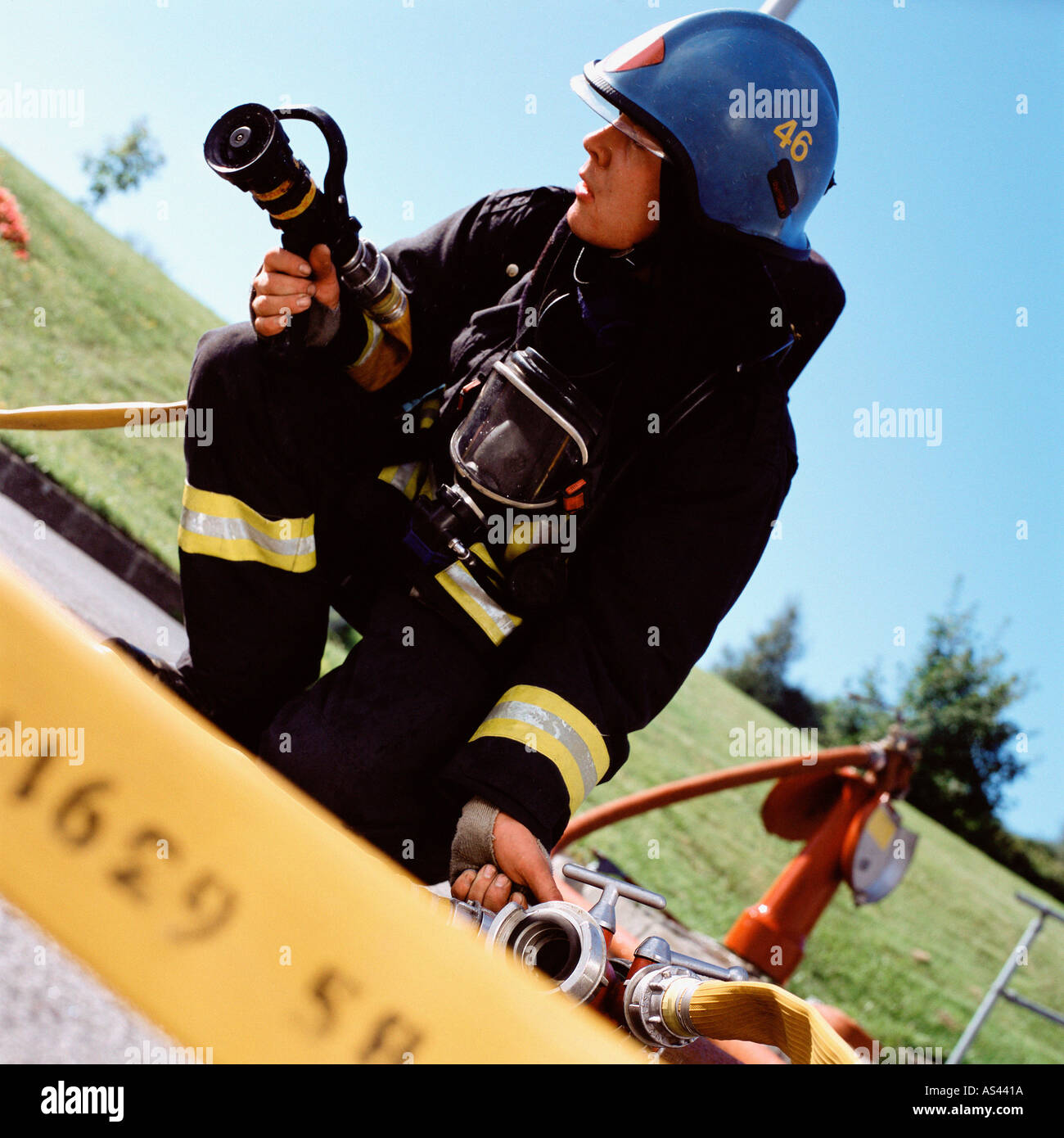Fireman Hose High Resolution Stock Photography and Images - Alamy