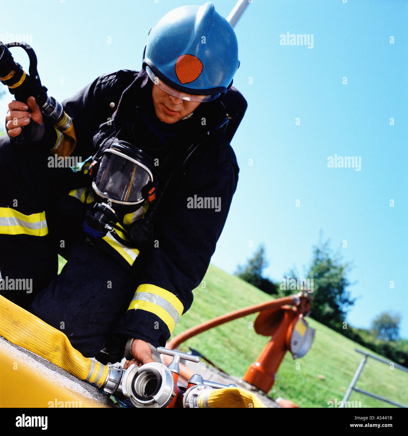 Fireman Hose High Resolution Stock Photography and Images - Alamy
