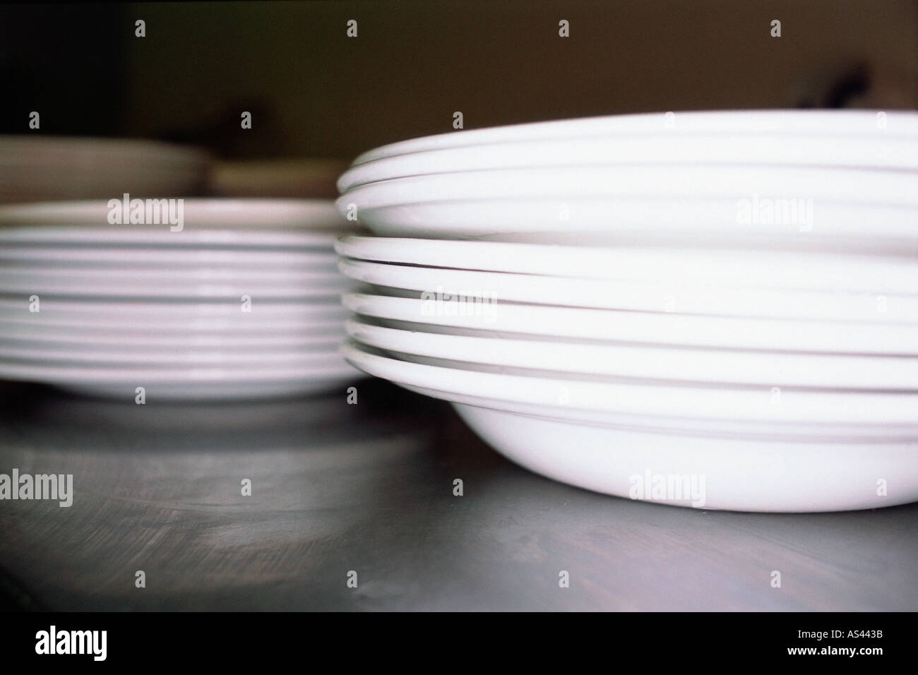 Stack of plates and bowls Stock Photo - Alamy