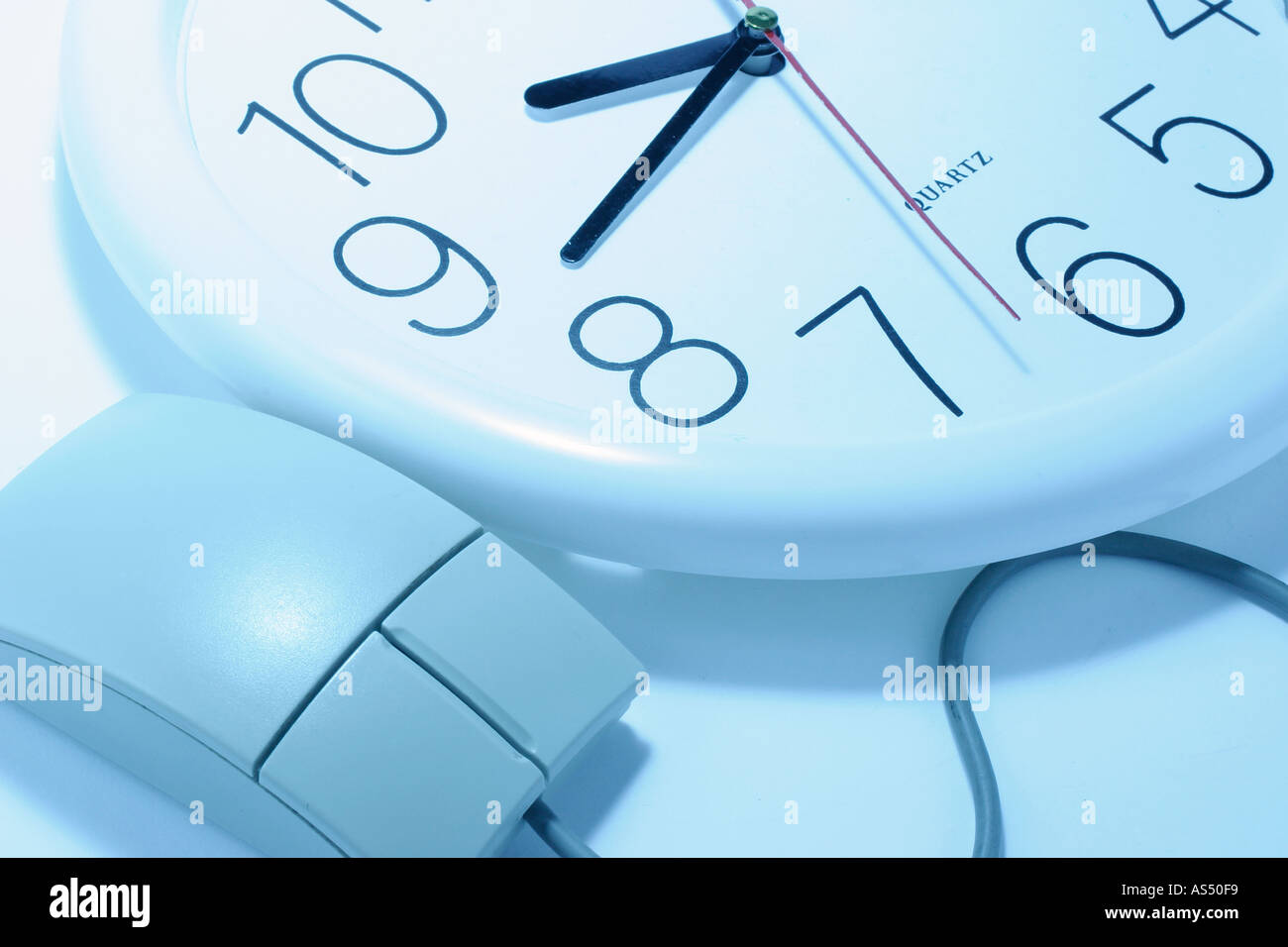 Computer Mouse and Clock Stock Photo - Alamy