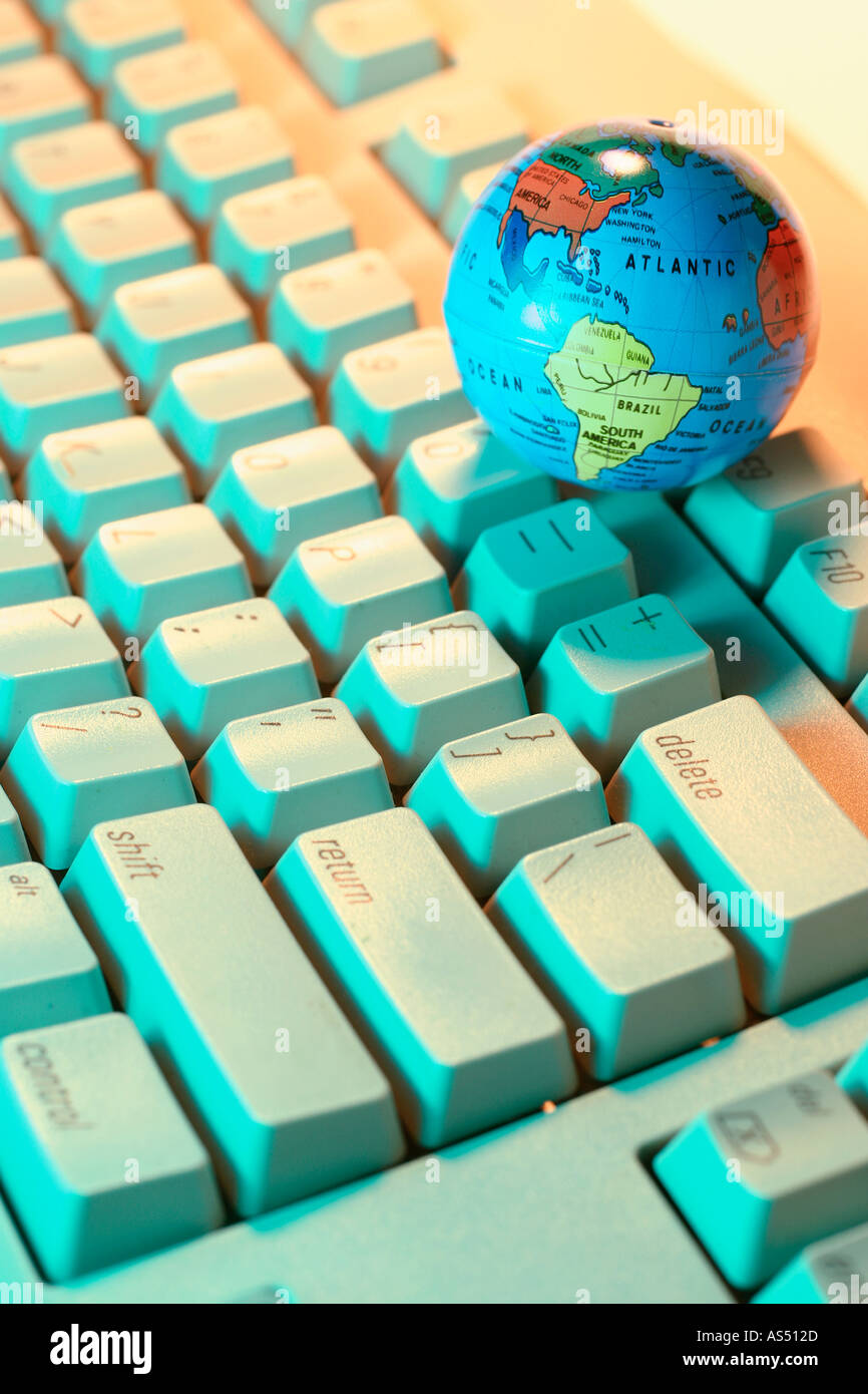 Globe on Computer Keyboard Stock Photo - Alamy