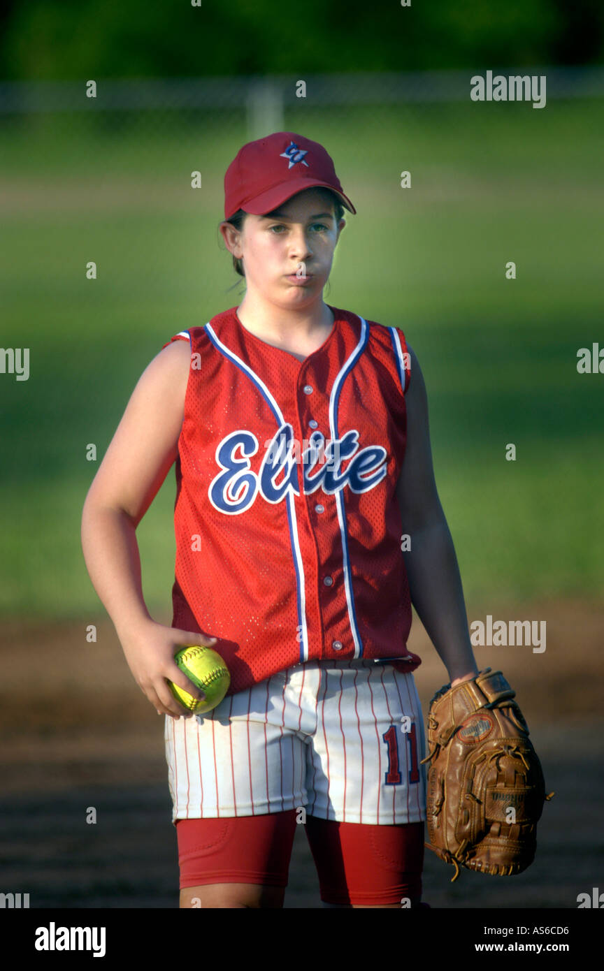 Young girl pitching and learning in real Fast Pitch Softball practice ...
