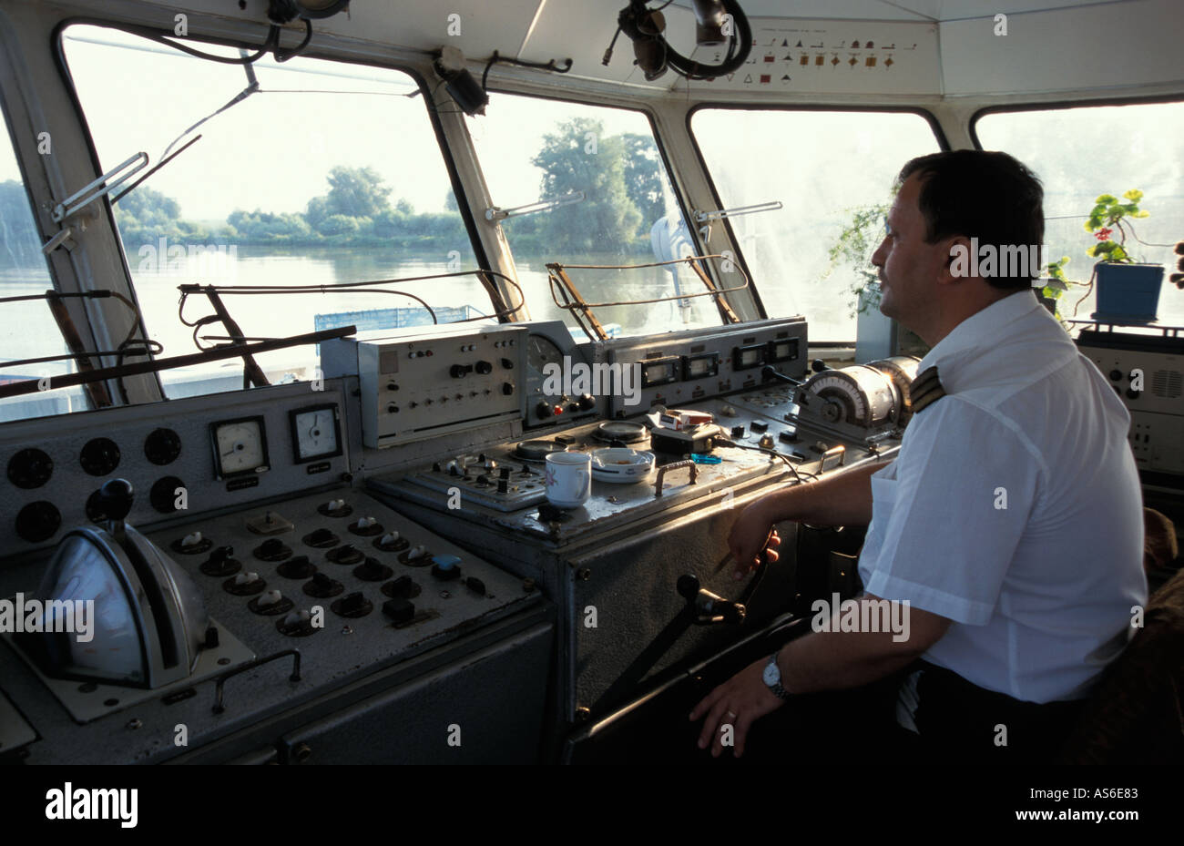 passenger boat, captain Stock Photo - Alamy