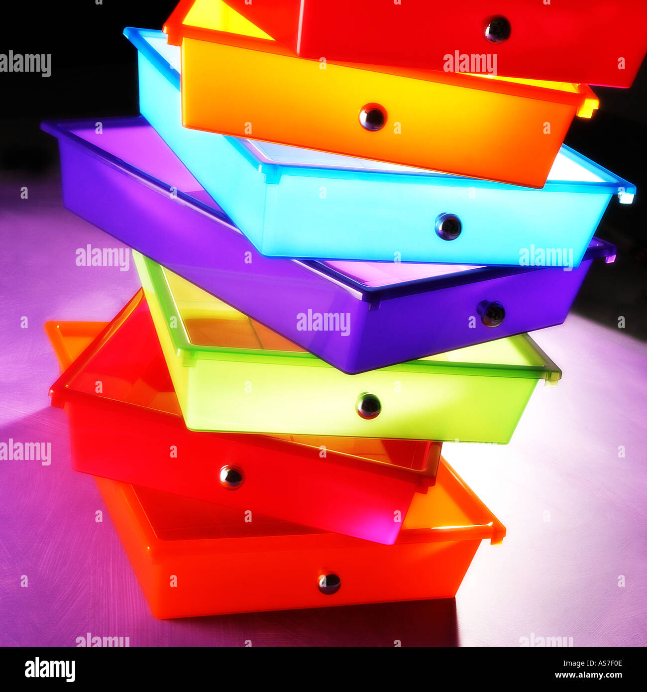Colourful plastic storage trays Stock Photo - Alamy