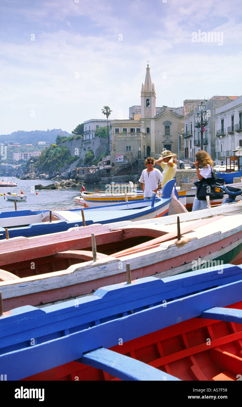 The Aeolian Island of Lipari, Italy. Young women visitors and local ...