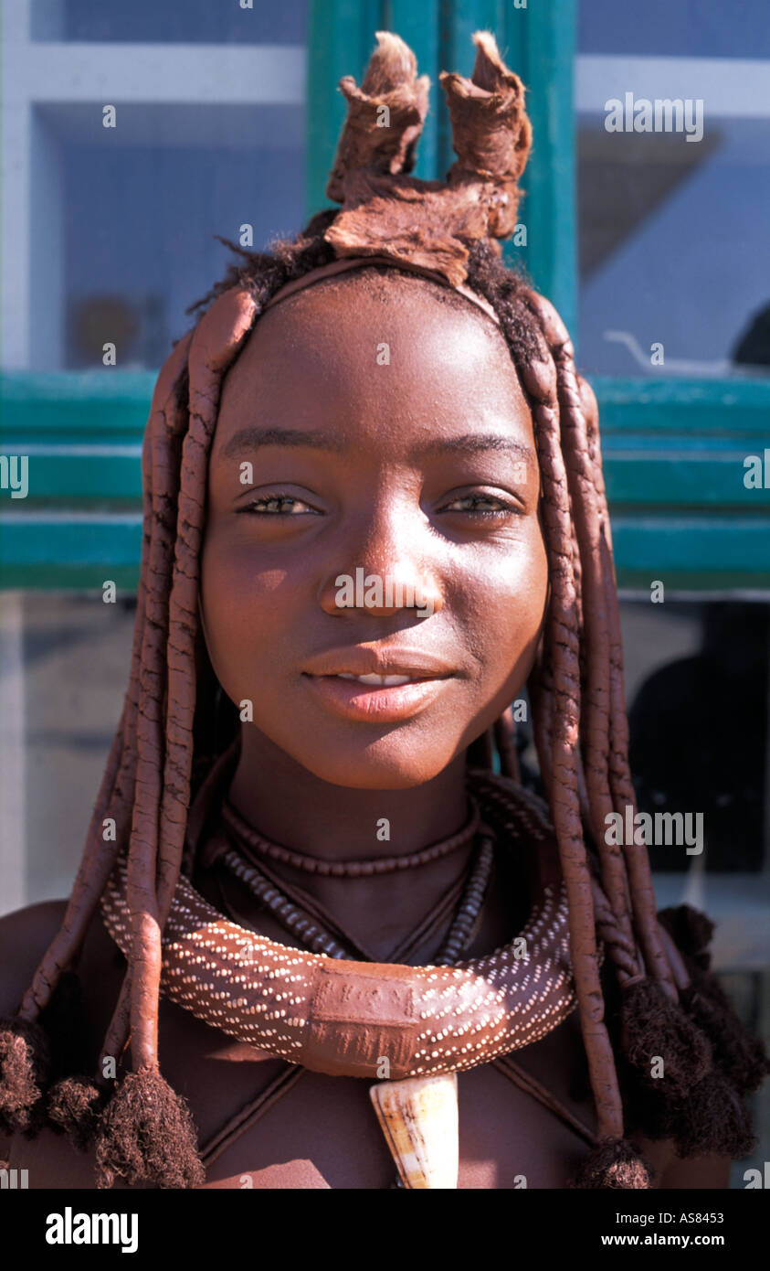 Teenage Himba girl showing her distinctive hair decoration and tribal ...