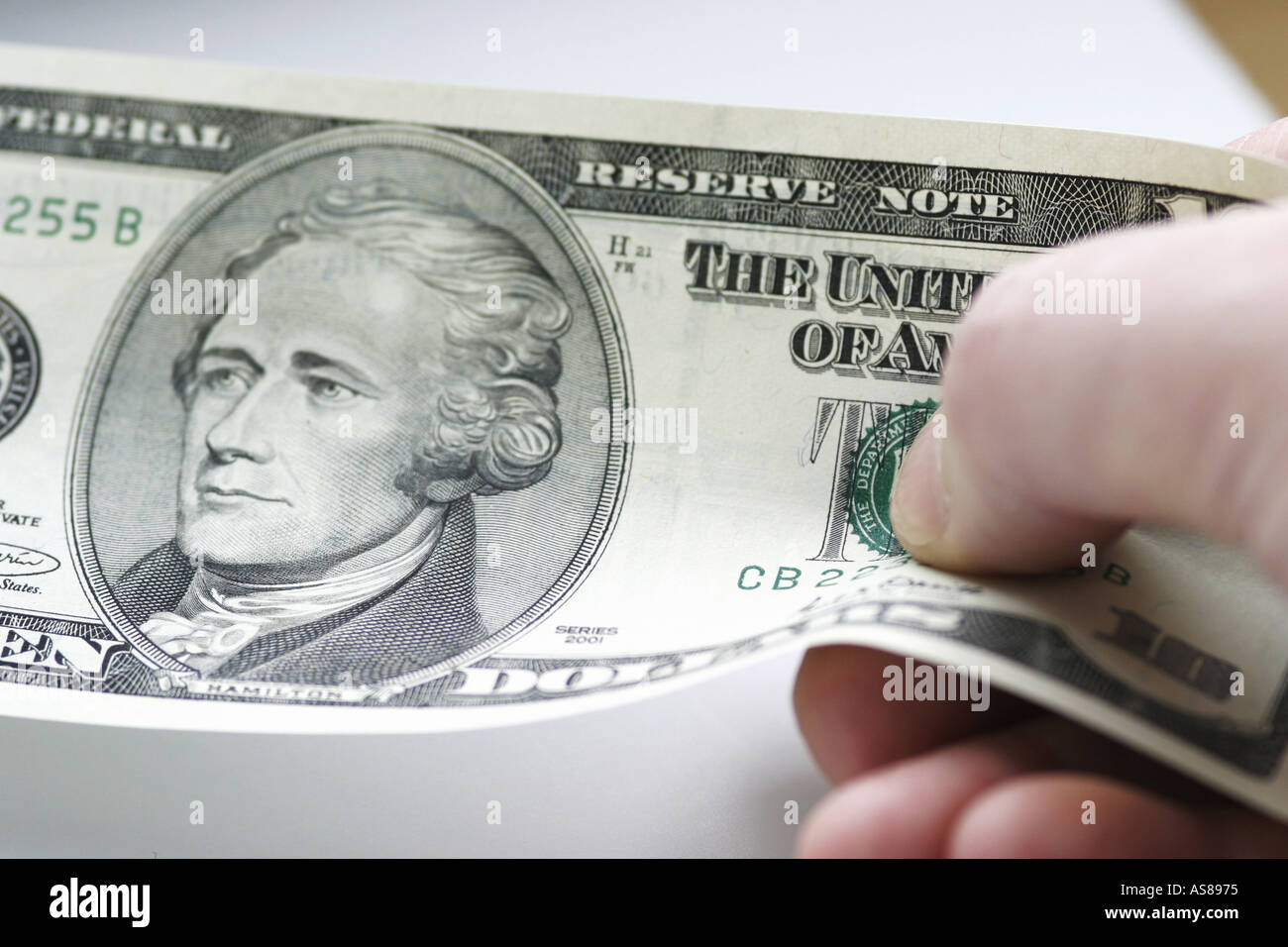 Dollars being given by hand Stock Photo - Alamy