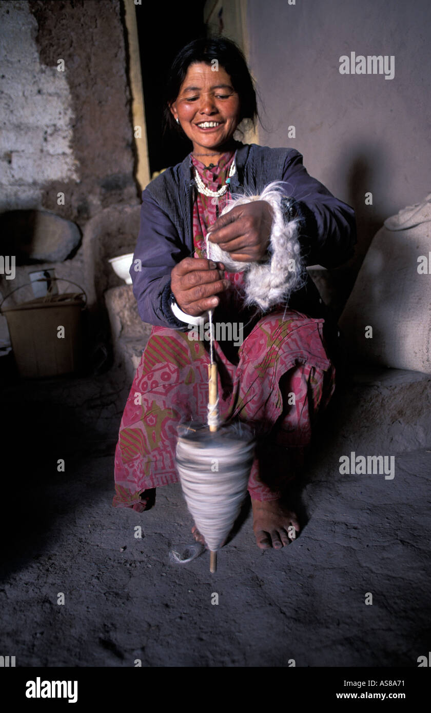 Ladakhhi women spinning wool with a drop spindle Ladakh nr Leh Ladakh ...
