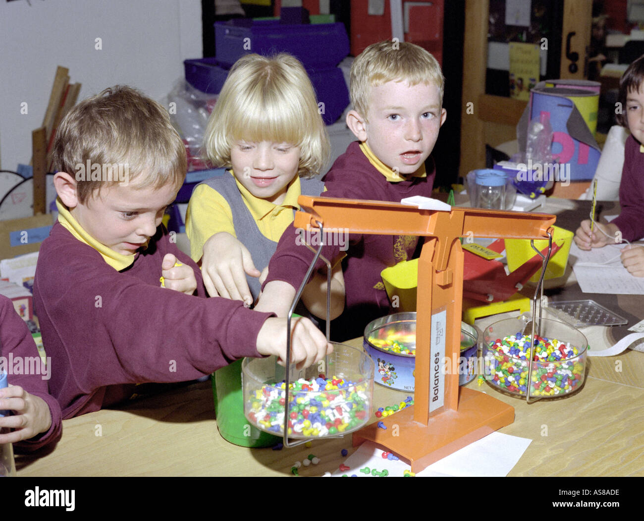 Schoolchildren Play With Scales in the Classroom Stock Photo - Alamy