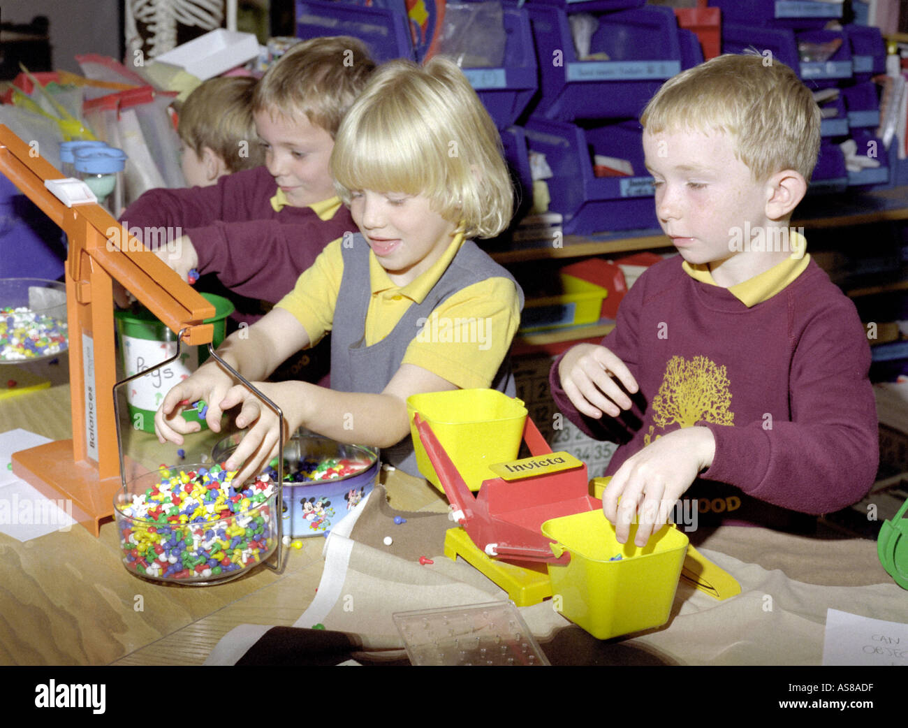 Schoolchildren Play With Scales in the Classroom Stock Photo - Alamy