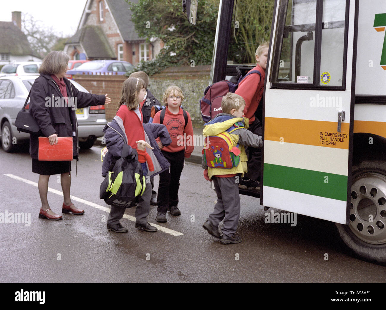 School Children Board the School Coach Stock Photo - Alamy