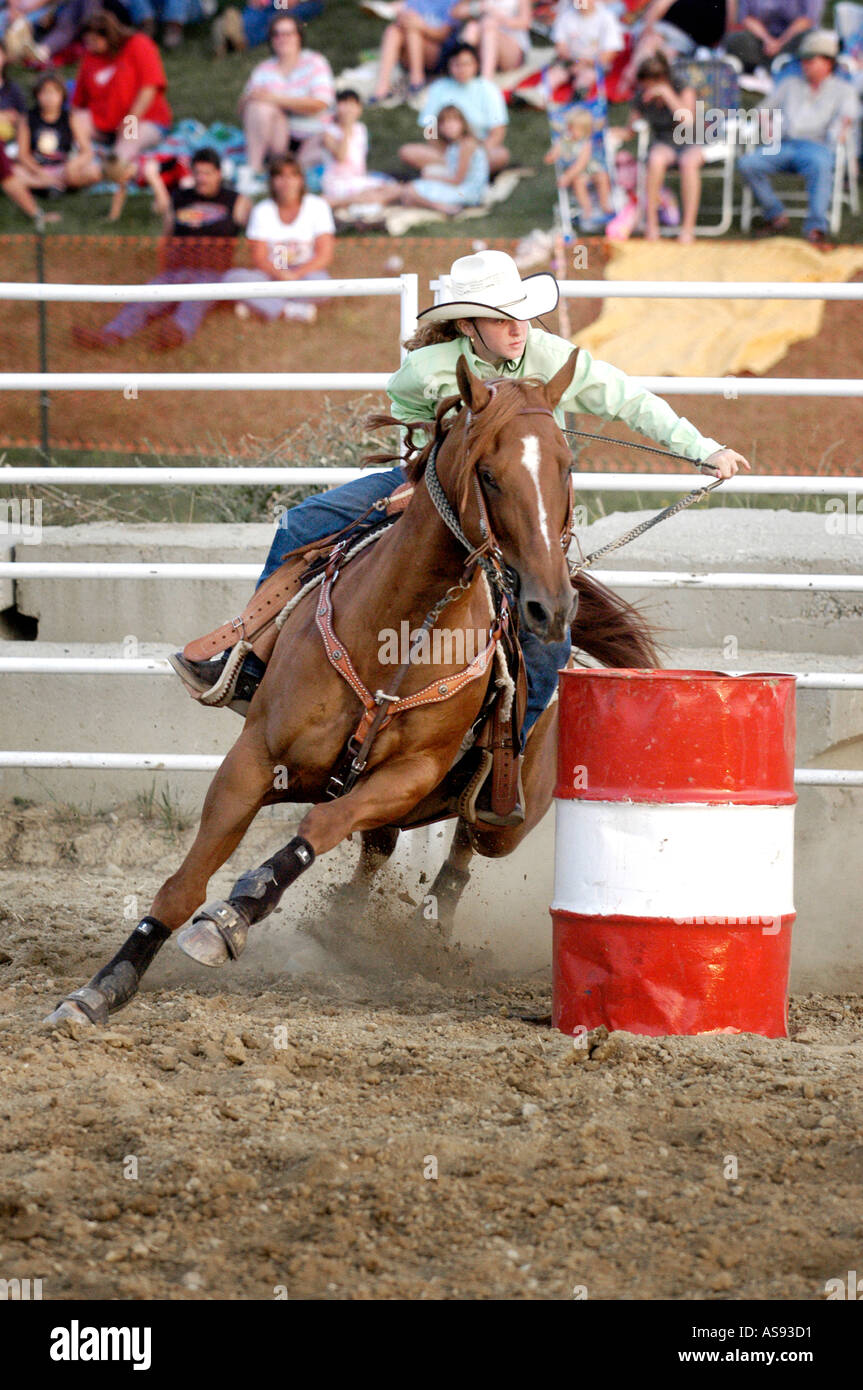 Female Compete in Rodeo Barrel Competition Stock Photo - Alamy