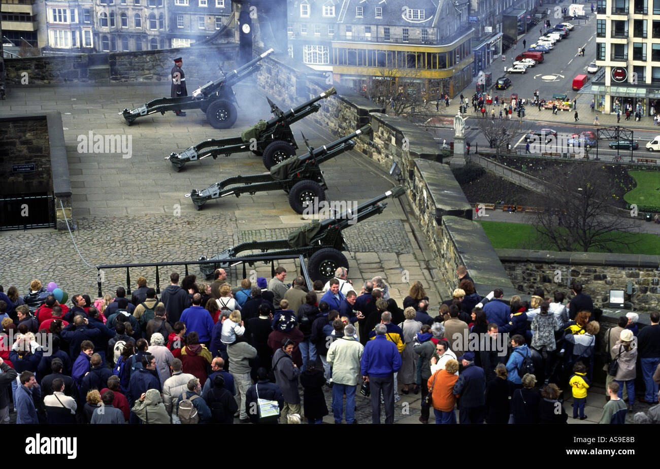 the one o clock gun firing at edinburgh castle scotland overlooking ...