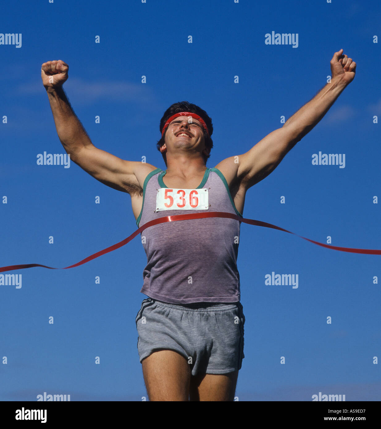 Running Crossing The Finish Line