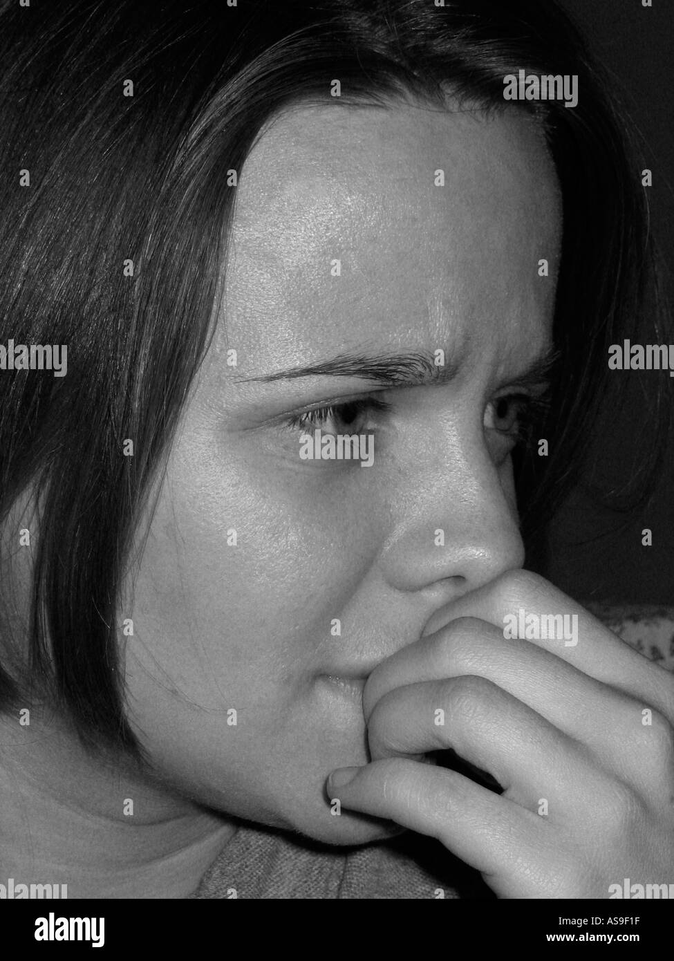 Sad faced woman Stock Photo - Alamy