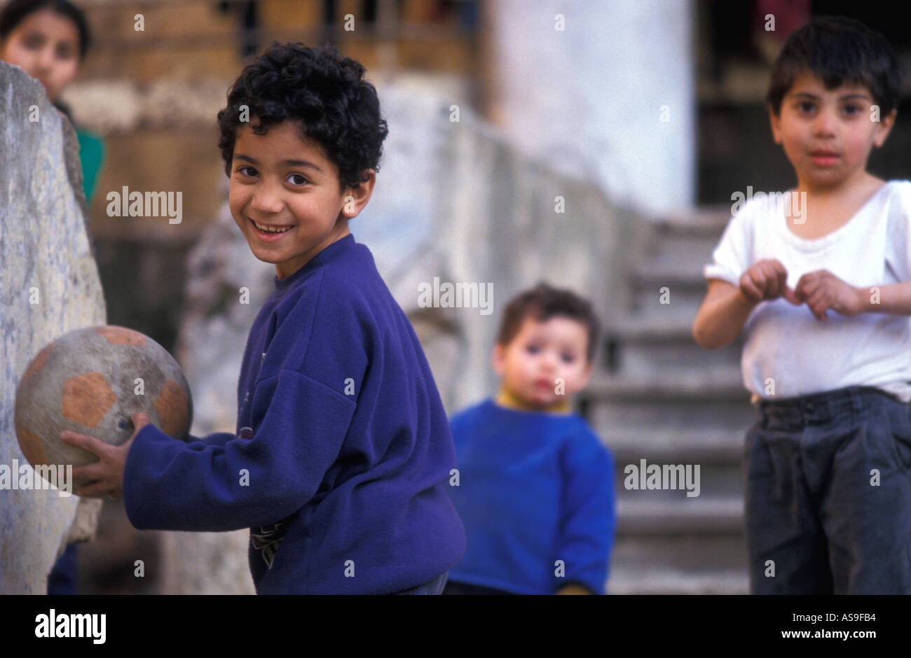 Arabic children playing football hi-res stock photography and images ...