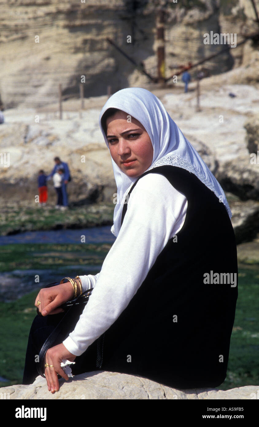 Arabic woman sitting by the coast, Beirut, Lebanon Stock Photo - Alamy